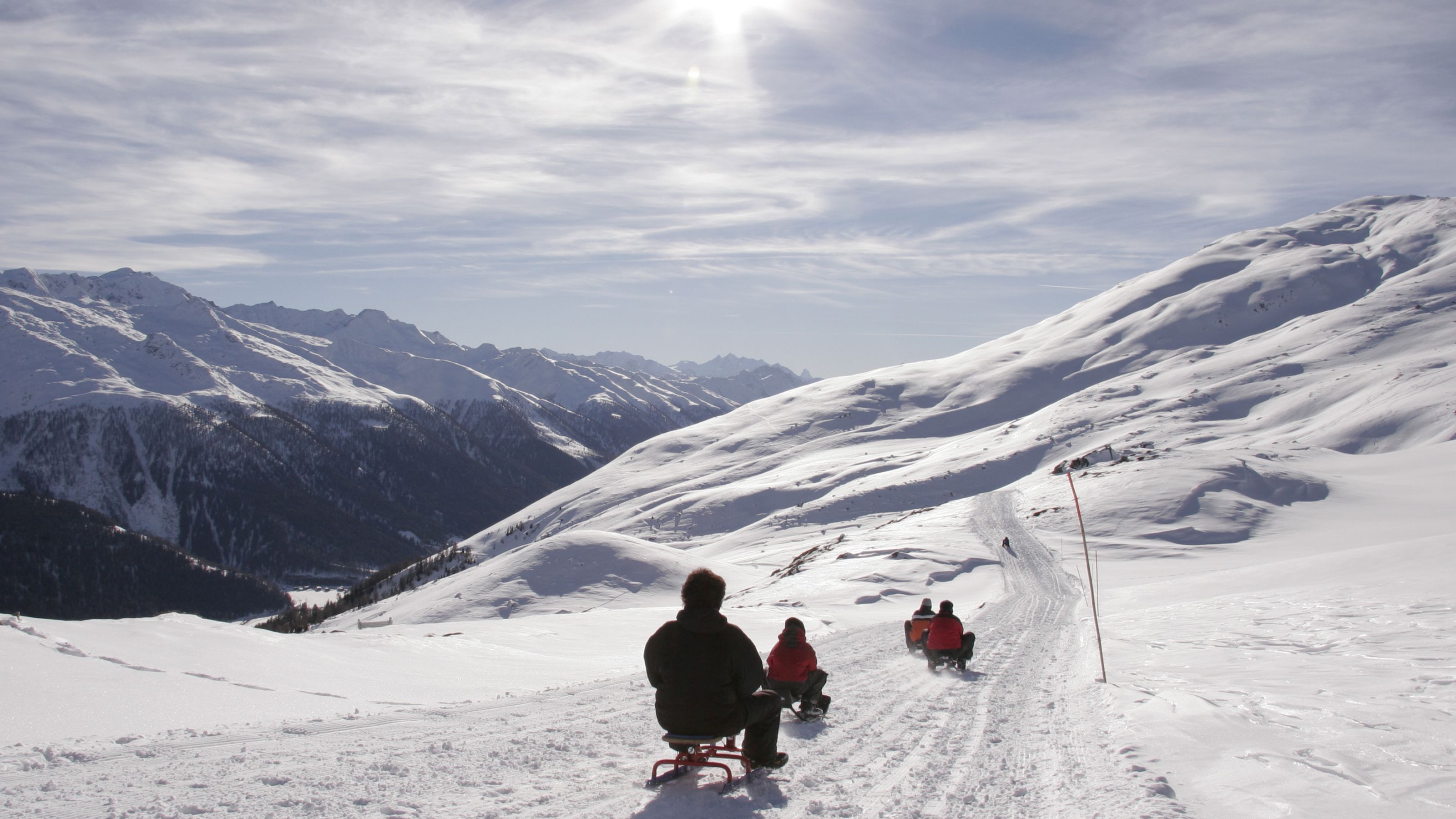 13 Kilometer-long toboggan fun | Switzerland Tourism